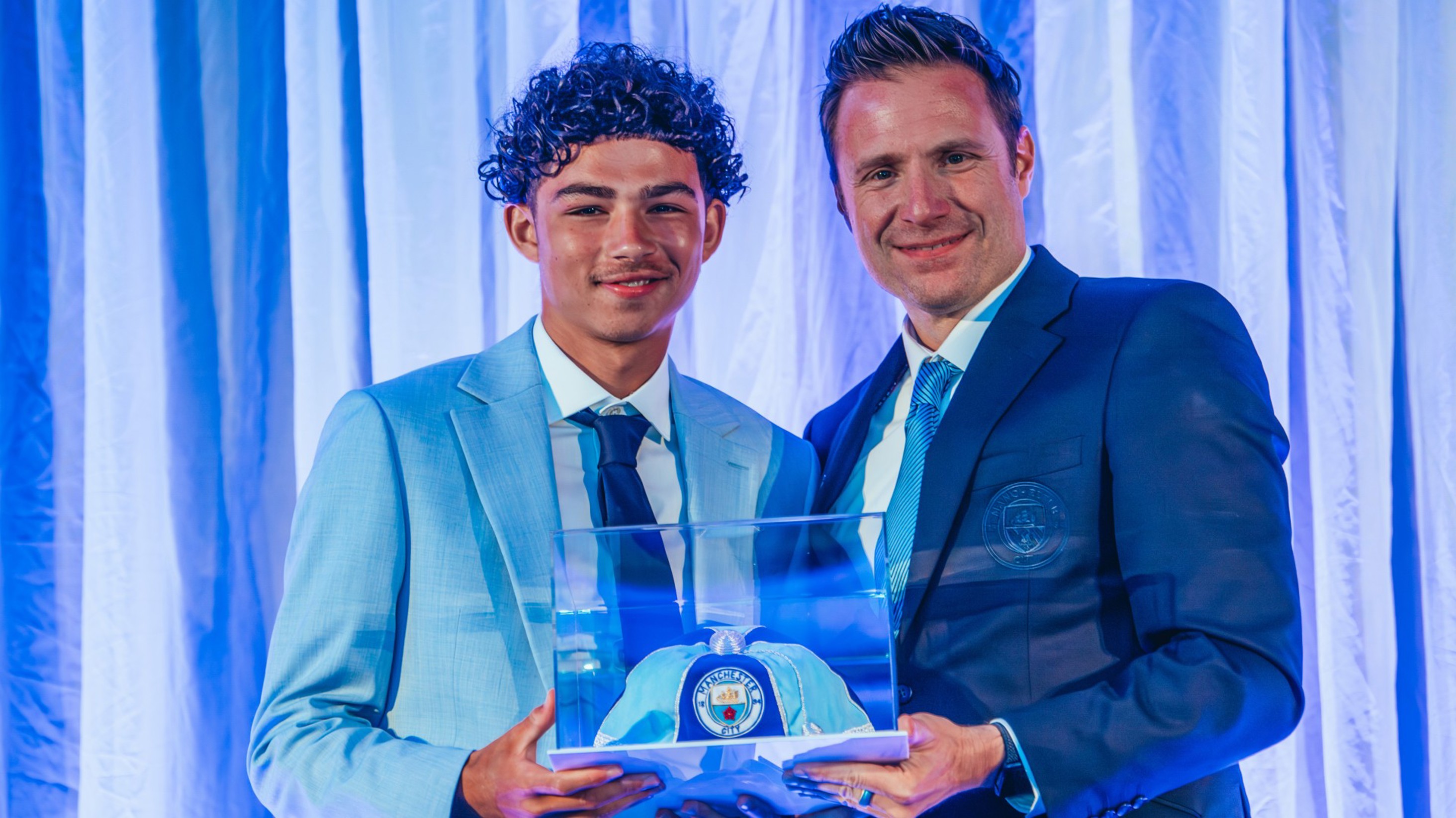 12 Academy players sign scholarships