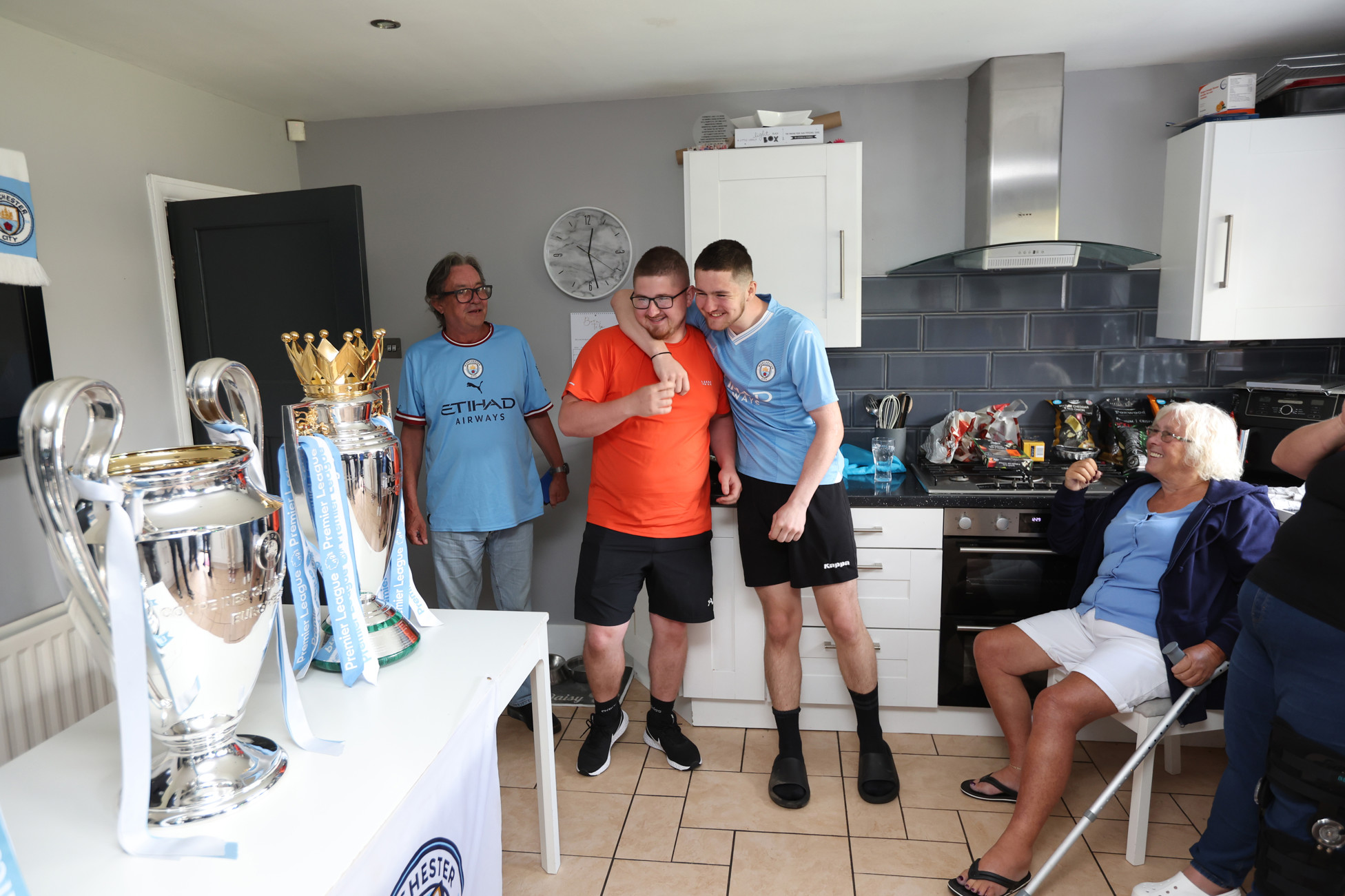 Official Supporters Club members surprised with Treble trophies