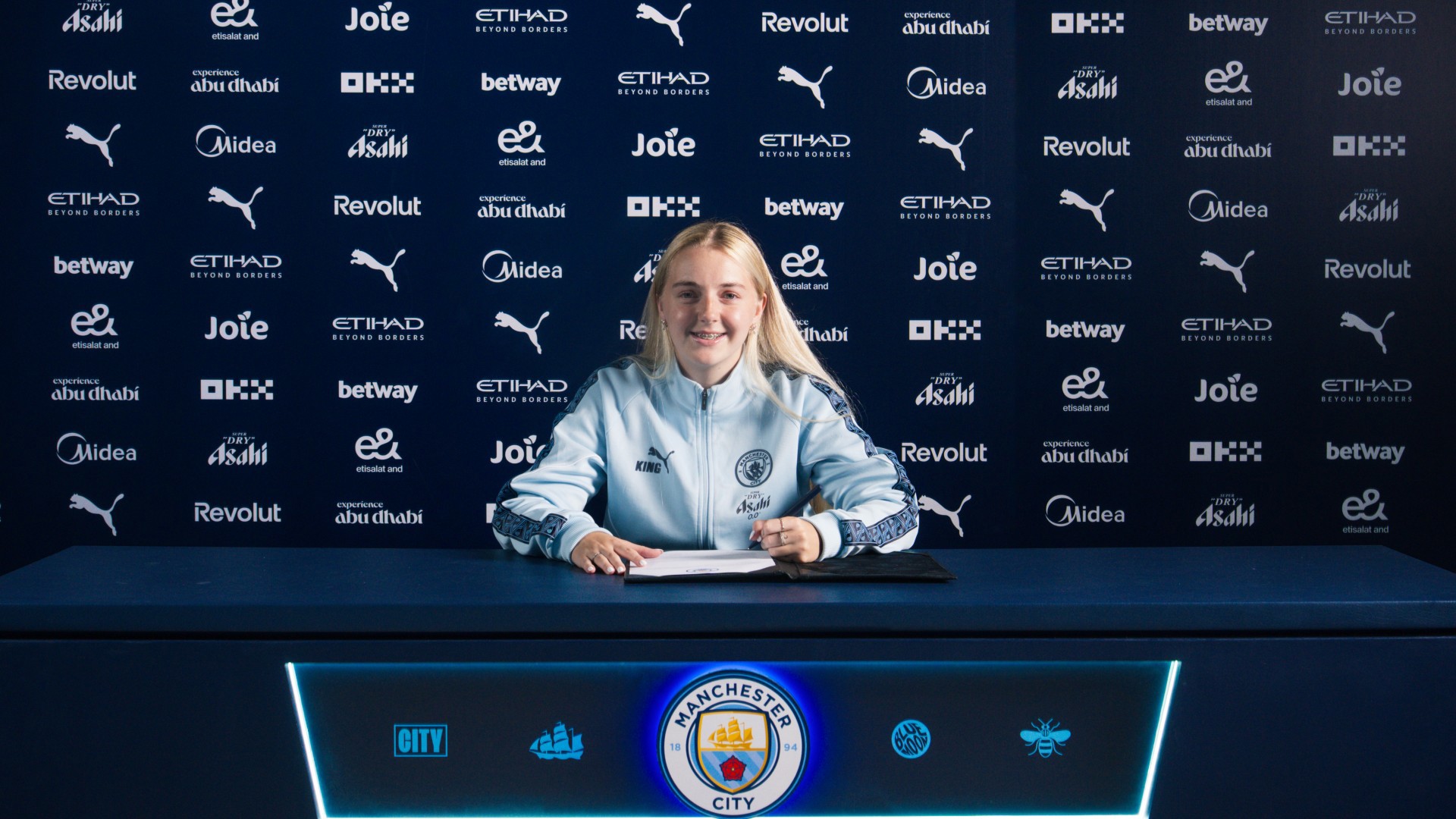 Davies signs first professional deal