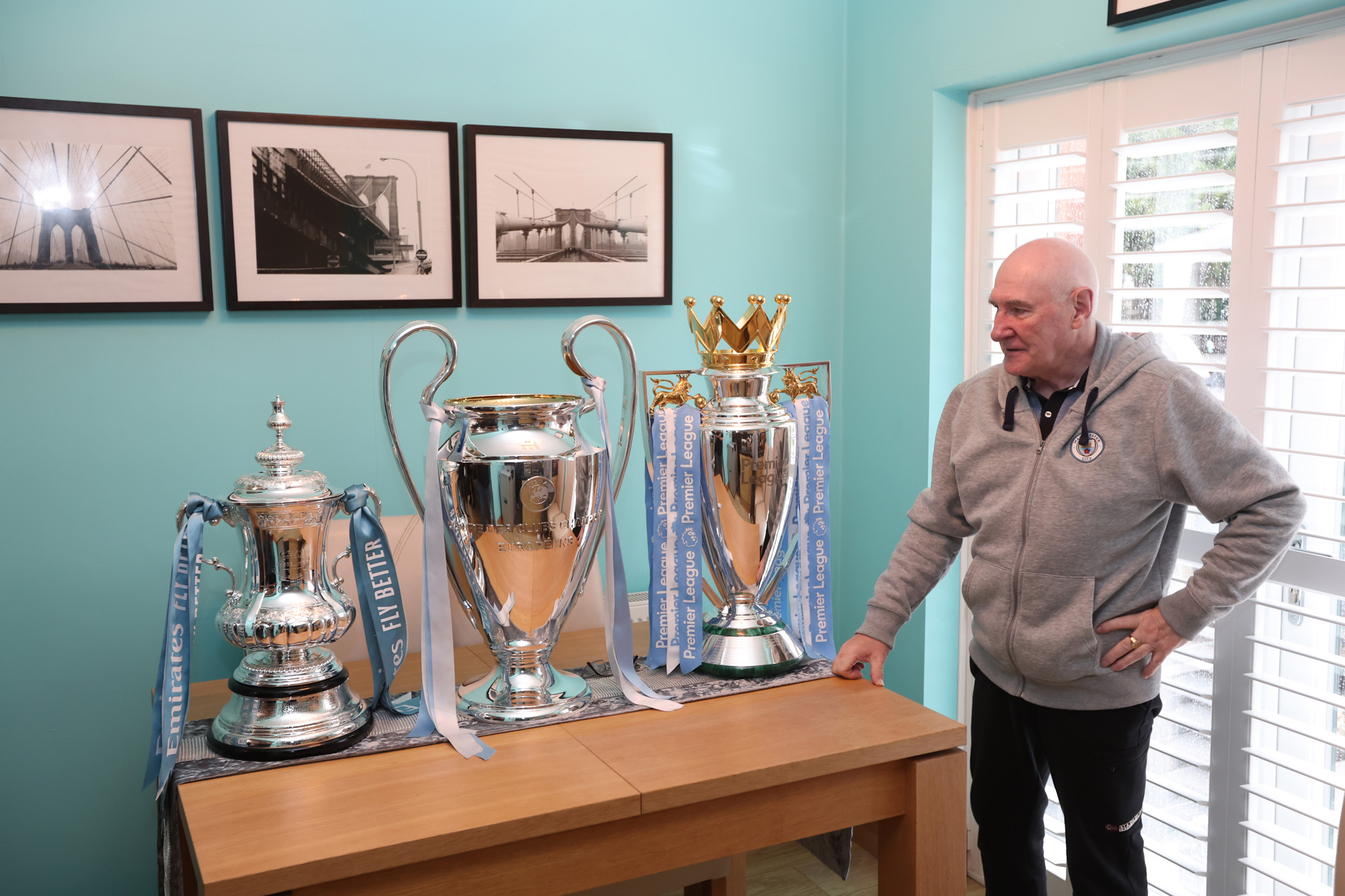 Official Supporters Club members surprised with Treble trophies