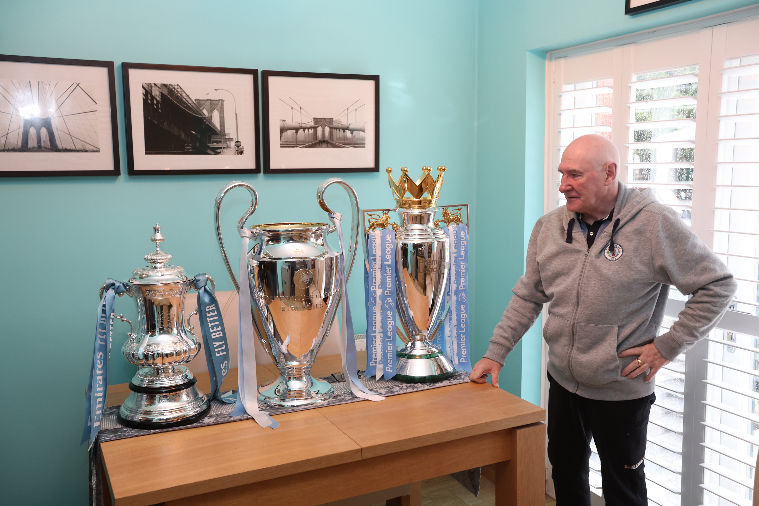 Official Supporters Club members surprised with Treble trophies