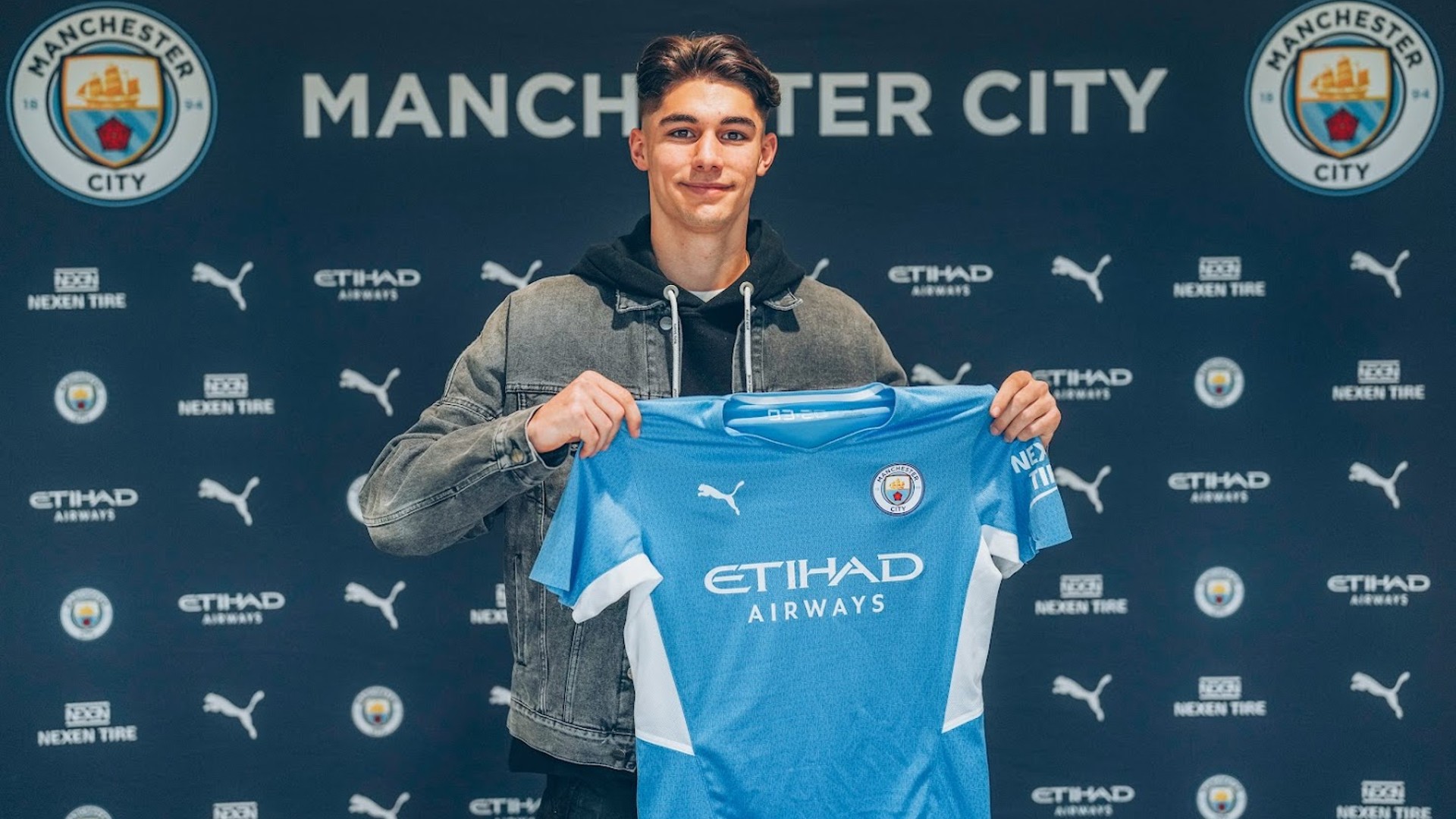 Burns and Charles sign new City deals