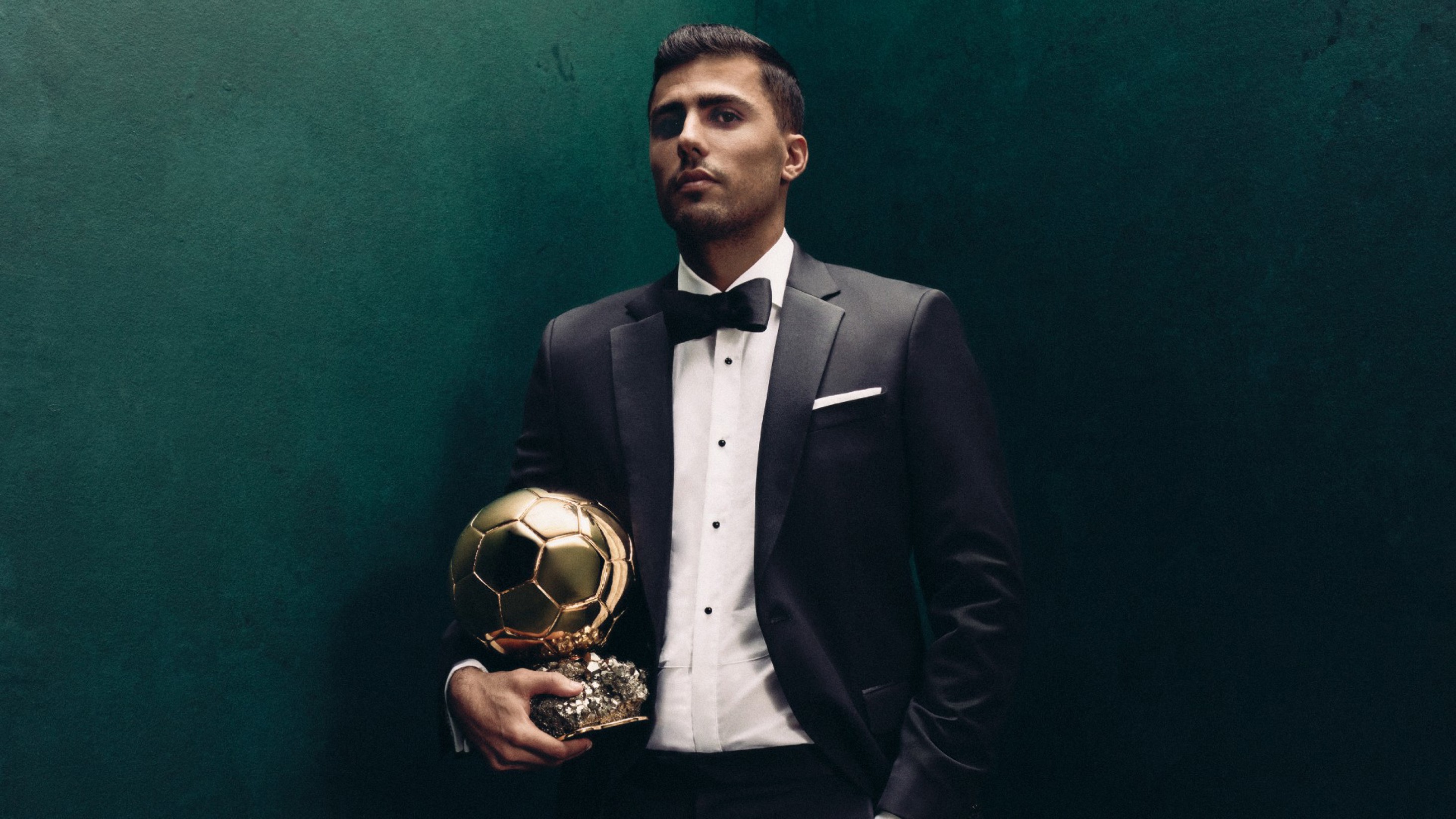 Gallery: Rodri gets suited up with his Ballon d'Or trophy