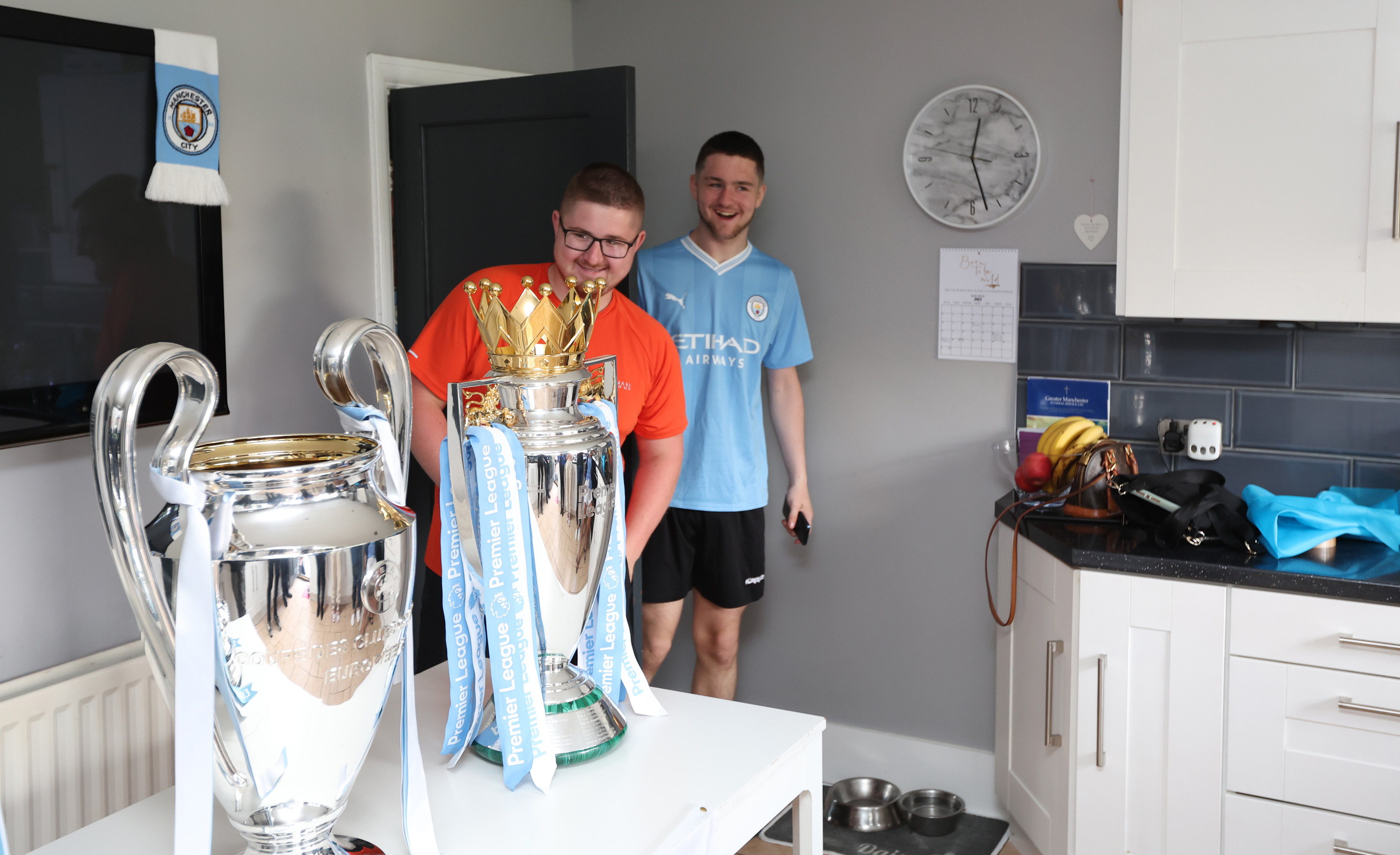 Official Supporters Club members surprised with Treble trophies